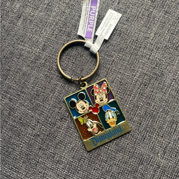Disney | Other | Disneyland Keychain With Stained Glass Look Featuring ...